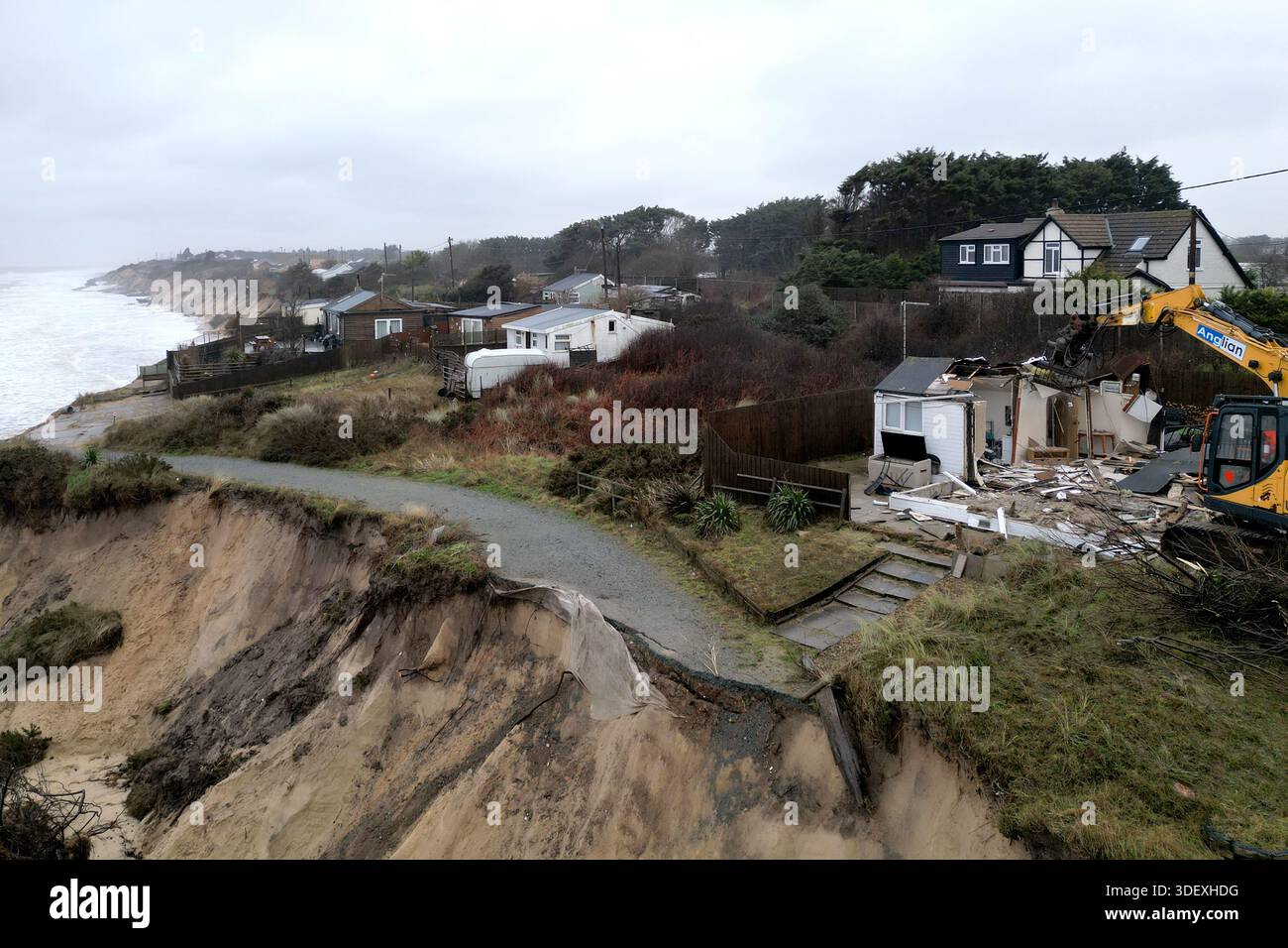 Properties being demolished close to the cliff edge at Hemsby in ...