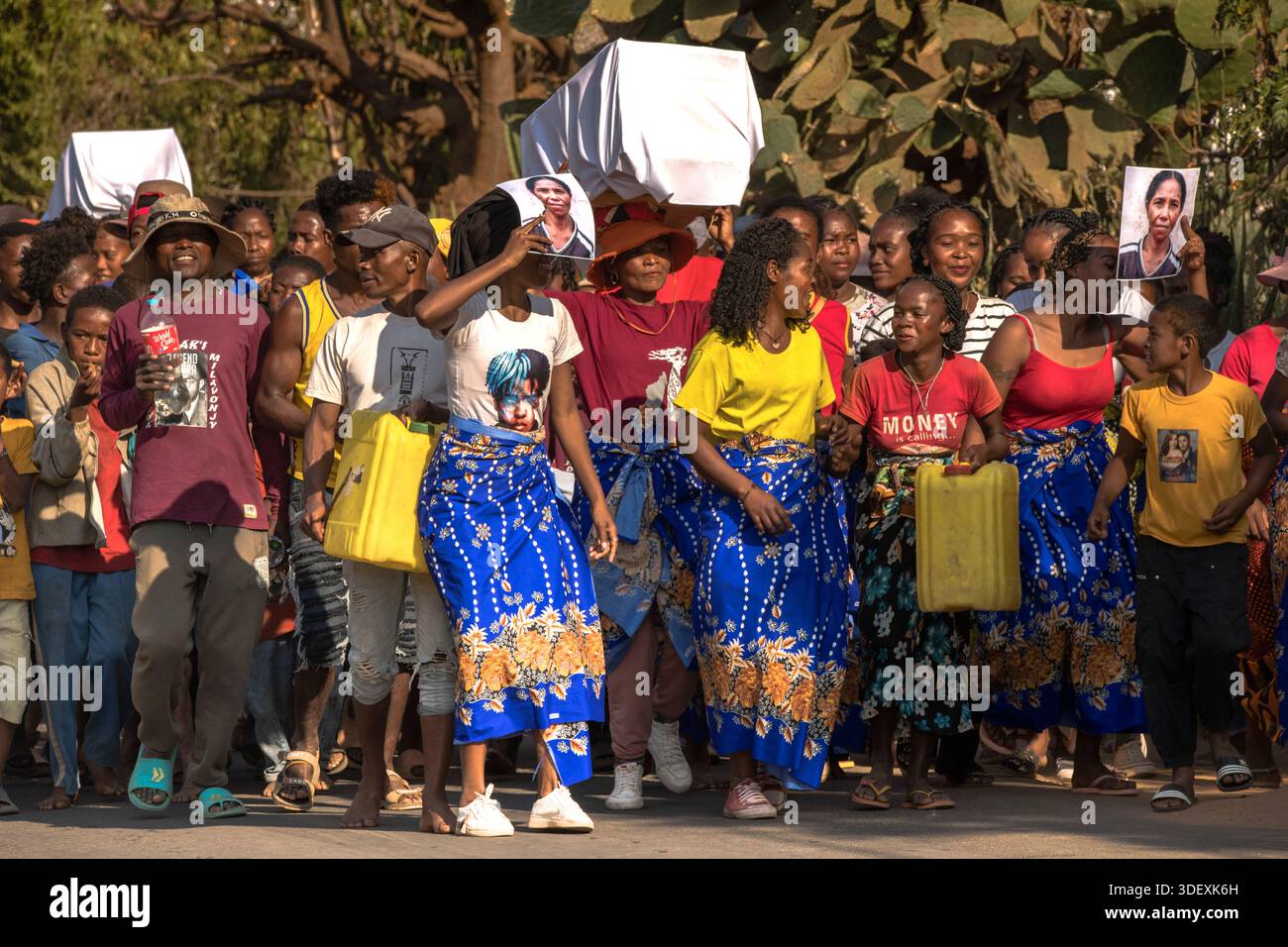 A secondary burial procession in Madagascar, known as Famadihana or the ...