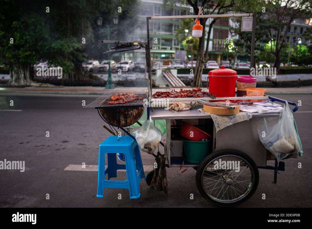 Vendor stall selling junk unhealthy food on walking street in Bangkok ...