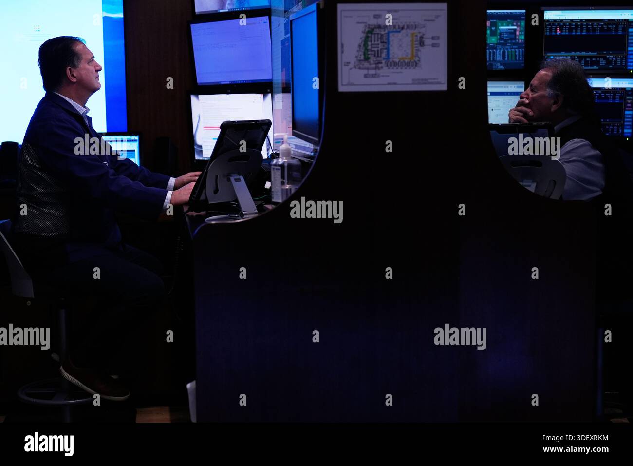 Traders work on the floor at the New York Stock Exchange in New York ...