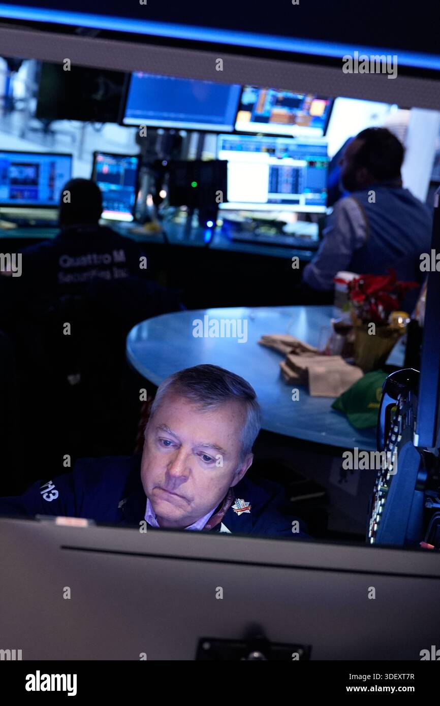 James Lamb works on the floor at the New York Stock Exchange in New ...