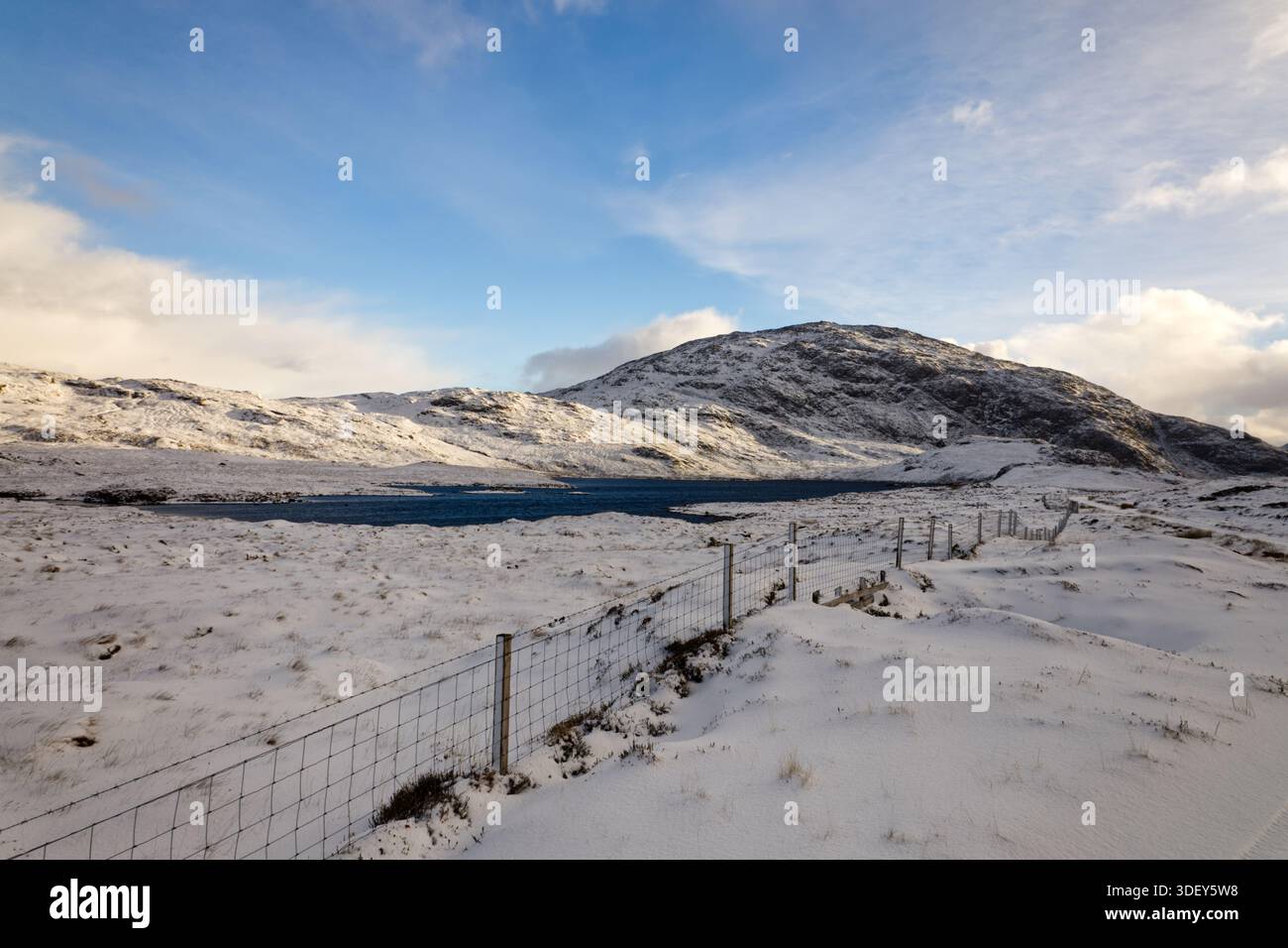 Snow on road and Mountains on Isle of Lewis Outer Hebrides Scotland ...
