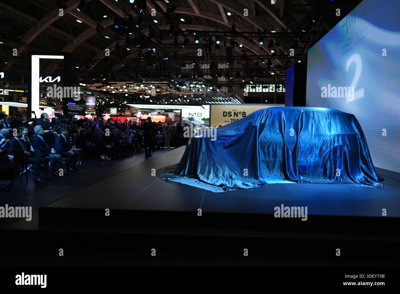 Audience members wait for the unveiling of the new Kia EV2 during the ...