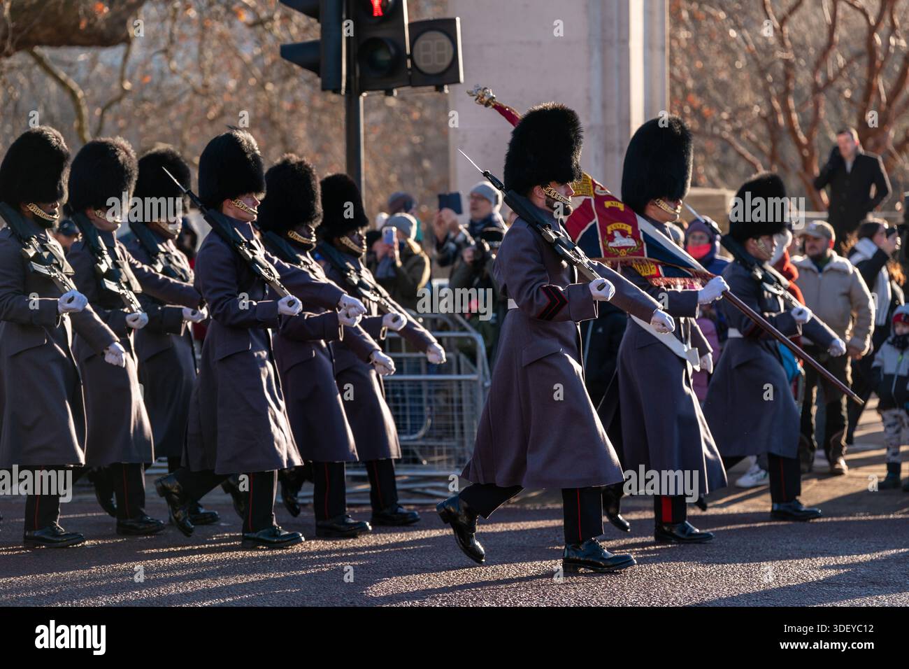 Members of the royal guard marching while participating in the changing ...
