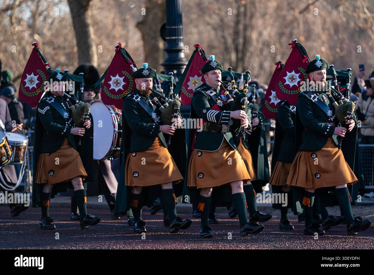 Members of the royal guard marching while participating in the changing ...