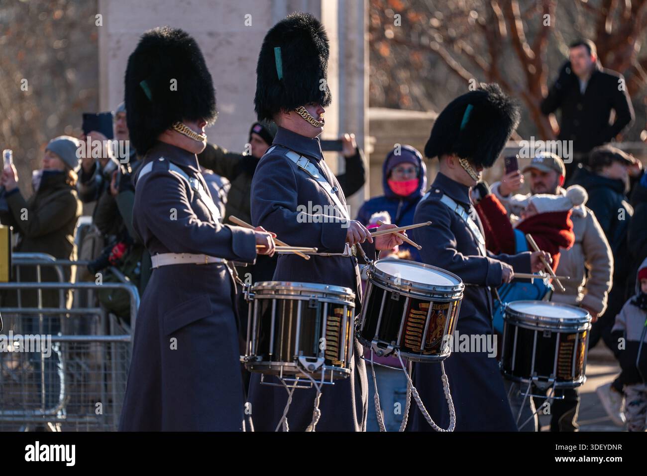 Members of the royal guard marching while participating in the changing ...
