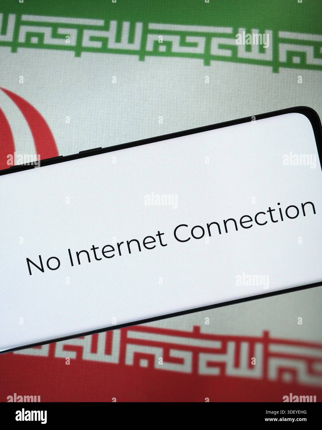 A smartphone displaying a no internet connection message is seen with ...