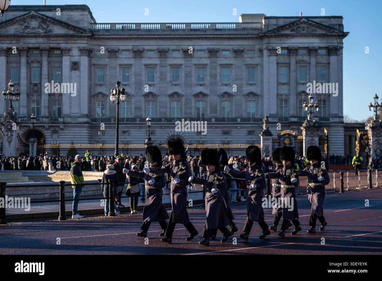 Members of the royal guard marching while participating in the changing ...