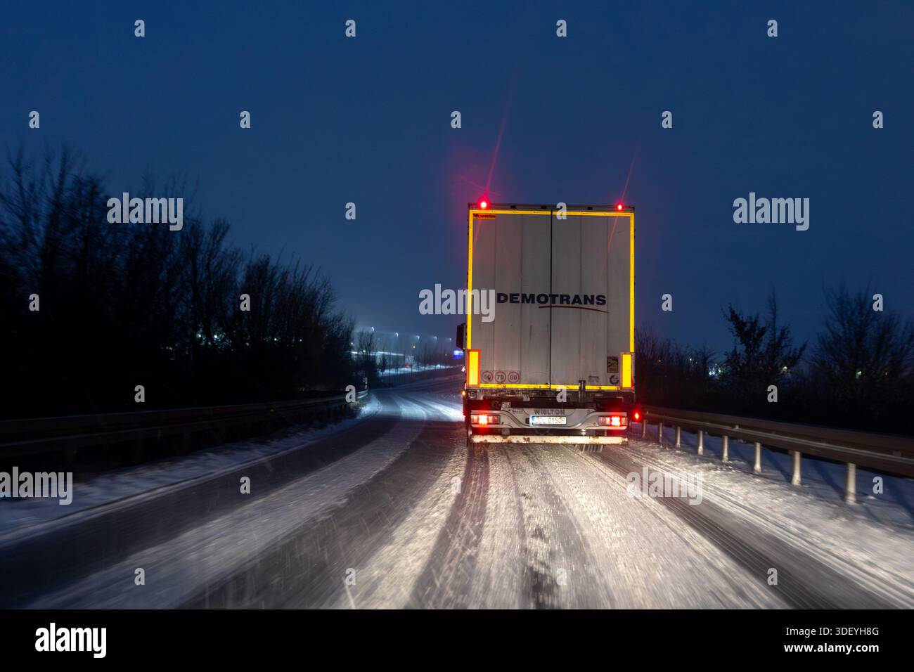Magdeburg, Germany. 9th Jan 2026. Truck traffic on snowy road in ...