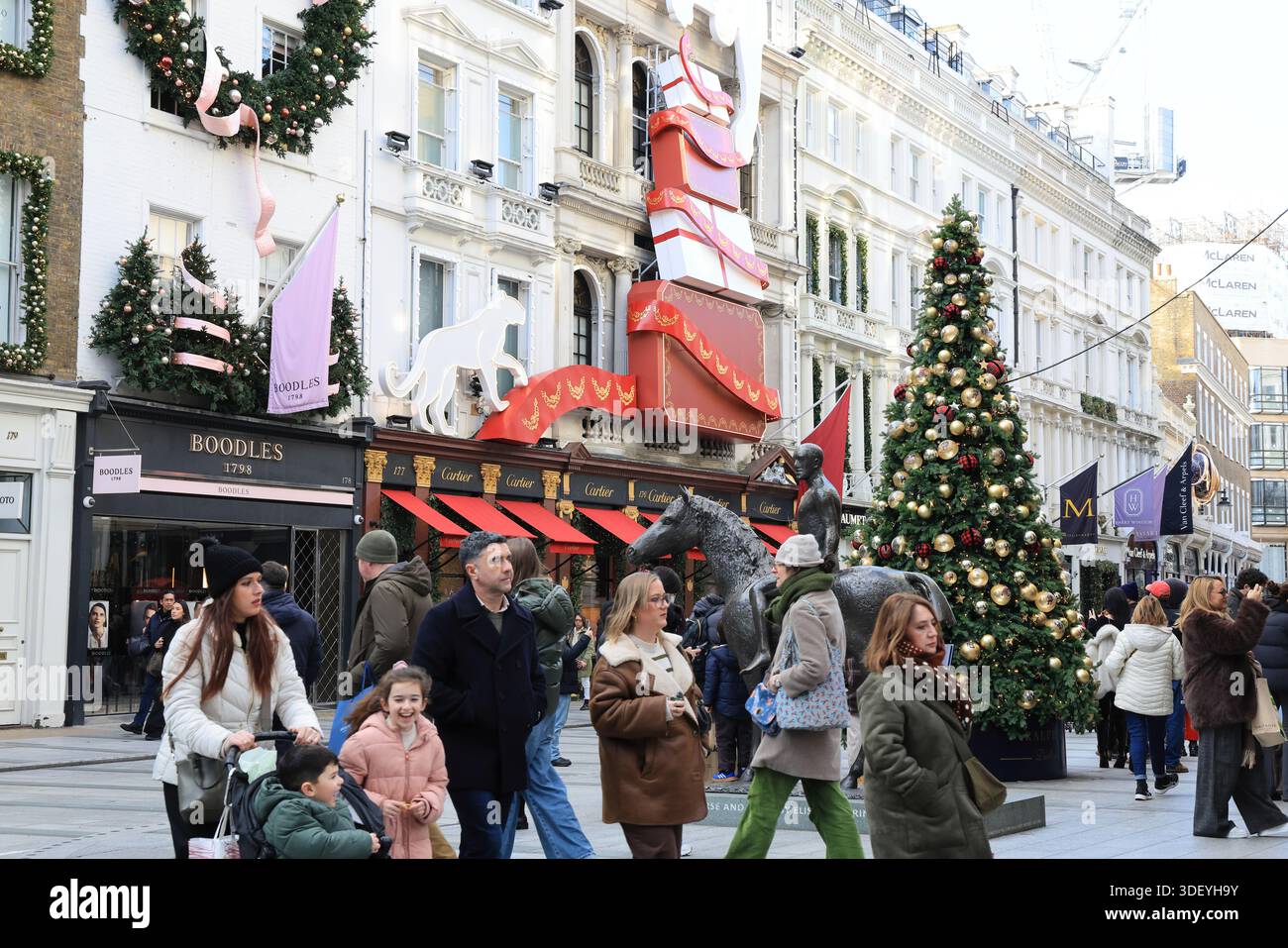 Upmarket shops on New Bond Street at Christmas time, in Mayfair, London ...
