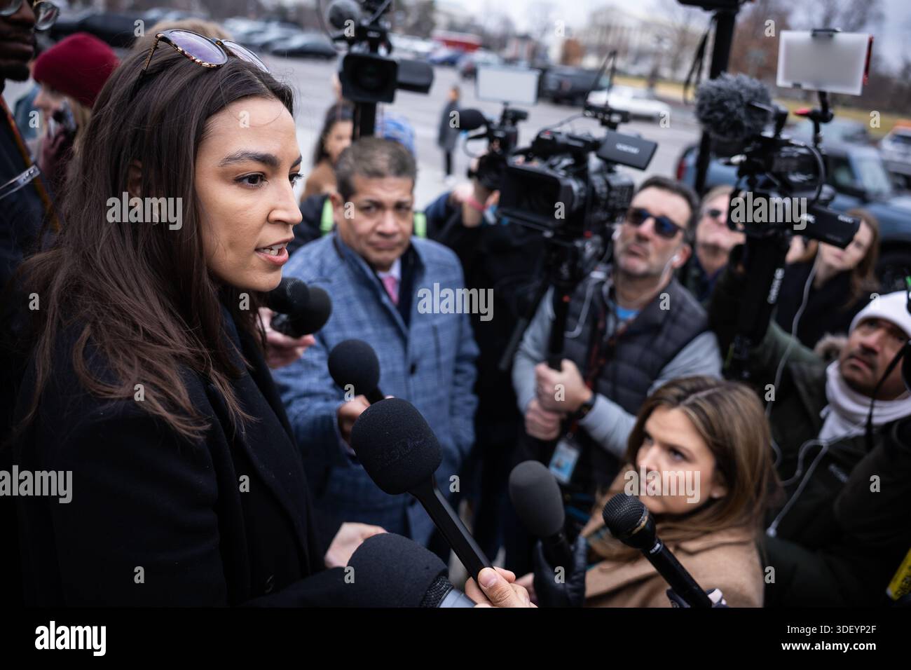 Rep. Alexandria Ocasio-Cortez (D-N.Y.) speaks with reporters as she ...