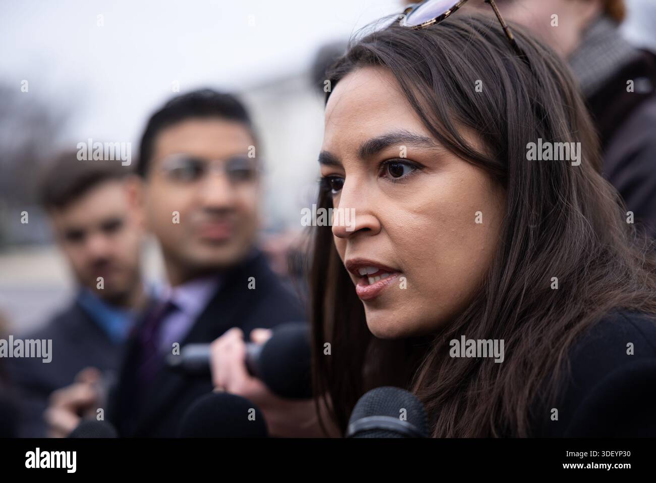 Rep. Alexandria Ocasio-Cortez (D-N.Y.) speaks with reporters as she ...