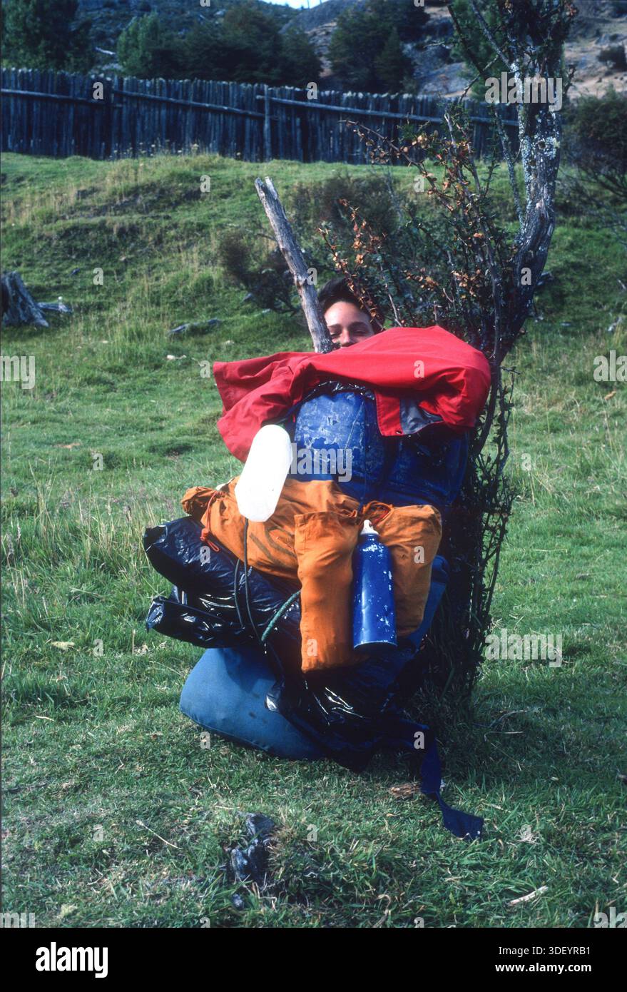 Teenager hiding behind rucksack in Chile, South America 1988 Stock ...