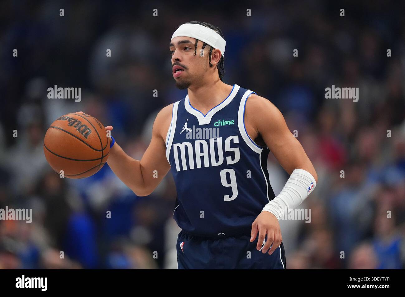 Dallas Mavericks guard Ryan Nembhard (9) dribbles up court during an ...