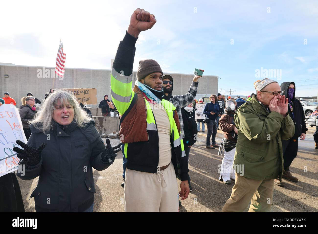 Protesters confront law enforcement outside the Bishop Henry Whipple ...