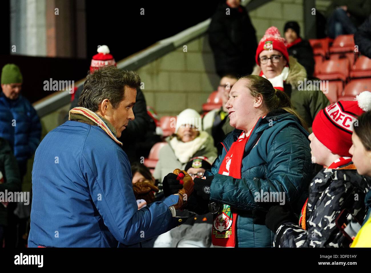 Wrexham co-owner Ryan Reynolds with a fan ahead of the Emirates FA Cup ...