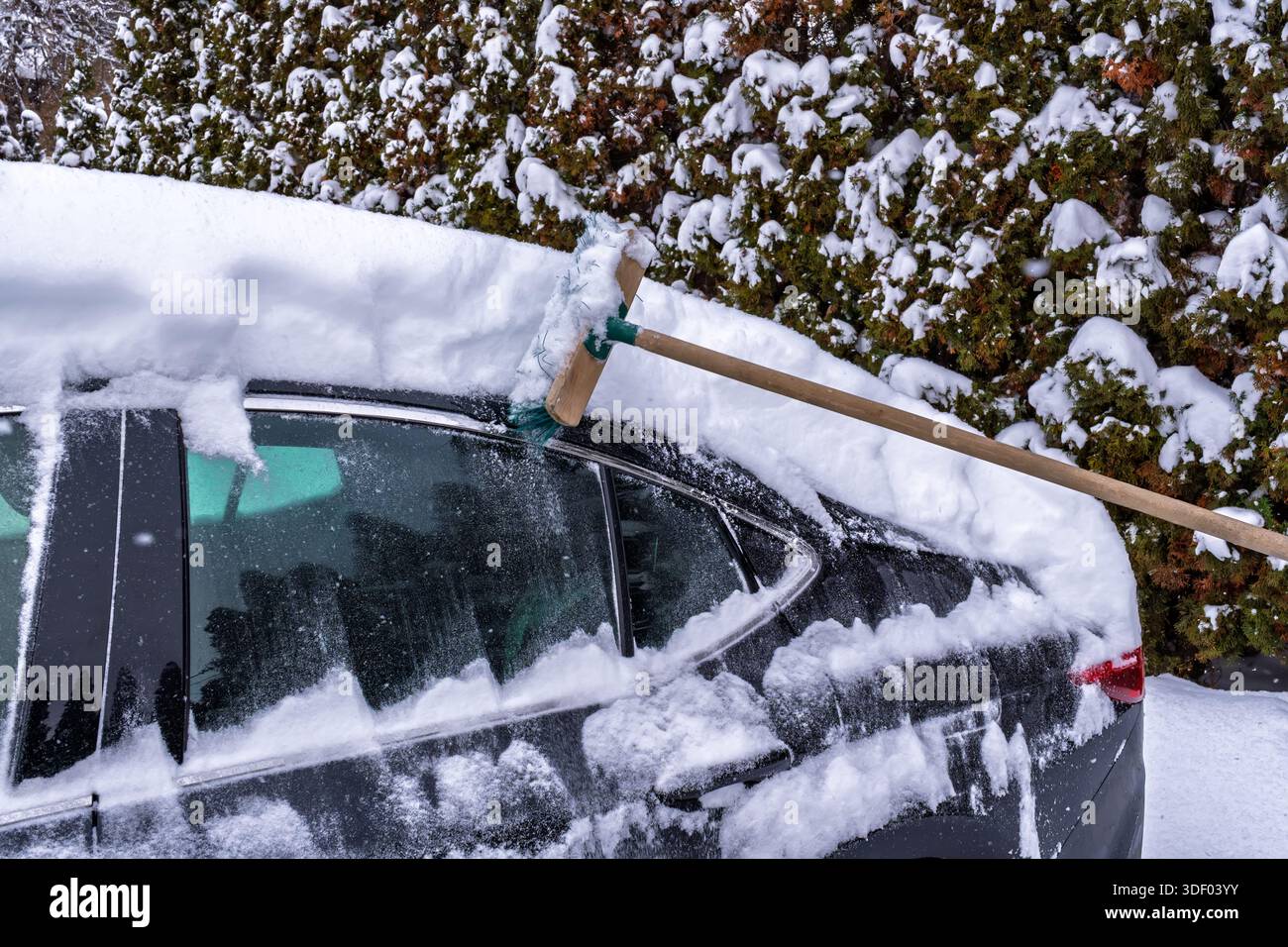 Removing thick layer white snow hi-res stock photography and images - Alamy