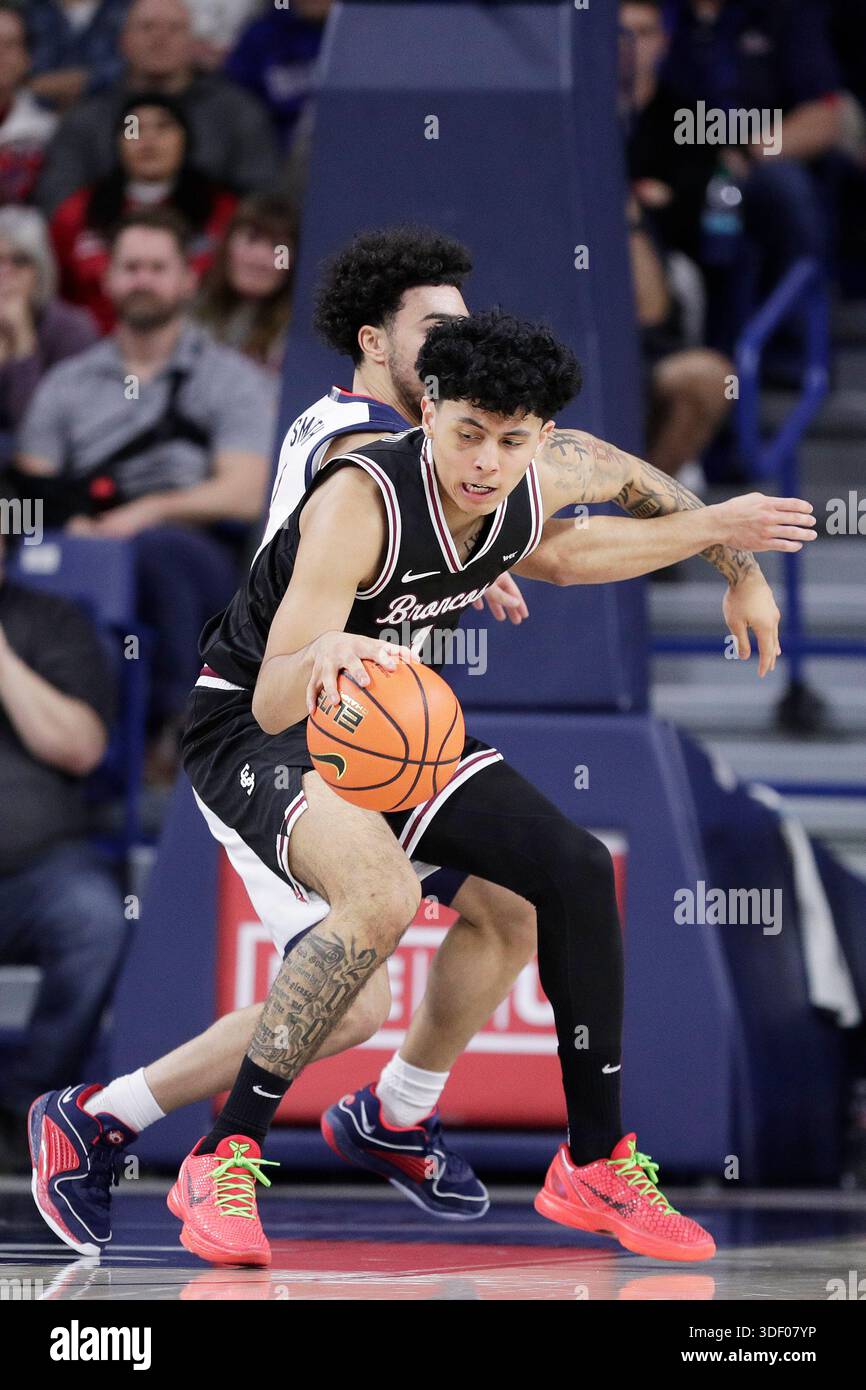 Santa Clara guard Christian Hammond, front, controls the ball while ...