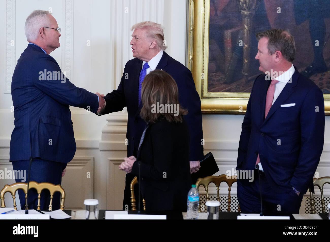 President Donald Trump speaks with Chief Executive Officer and Chairman ...