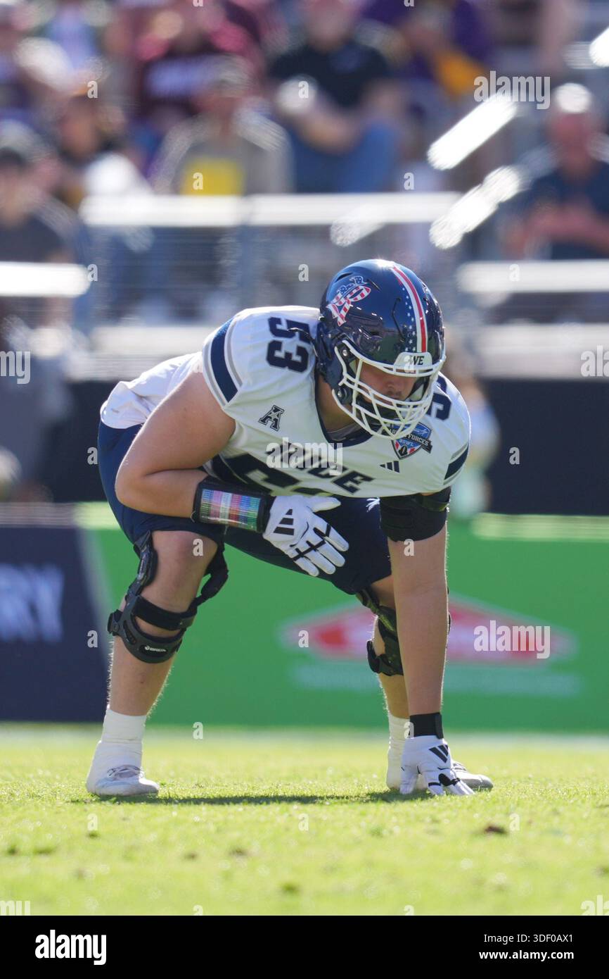 Rice offensive lineman Luke Miller (53) lines up for a play during the ...