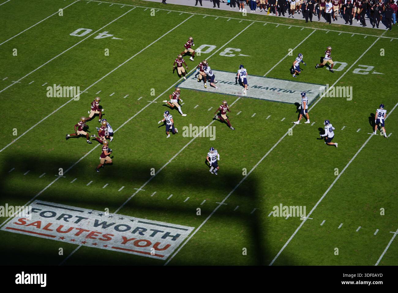 Texas State, left, kicks off to Rice during the second half of the ...