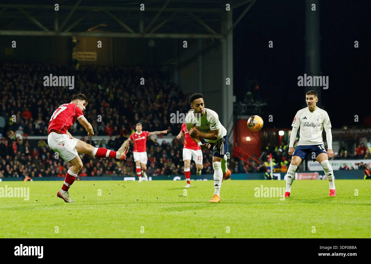 Wrexham, Wales, 9th January 2026. Ryan Longman of Wrexham (l) takes a ...