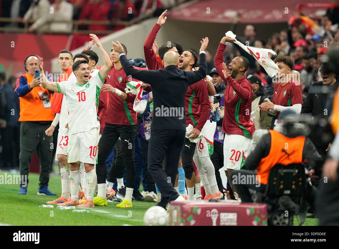 Morocco players celebrate after the Africa Cup of Nations quarterfinal ...