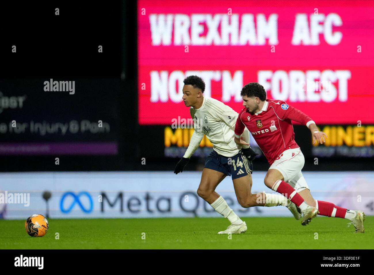 Nottingham Forest's Dan Ndoye, left, and Wrexham's Liberato Cacace ...