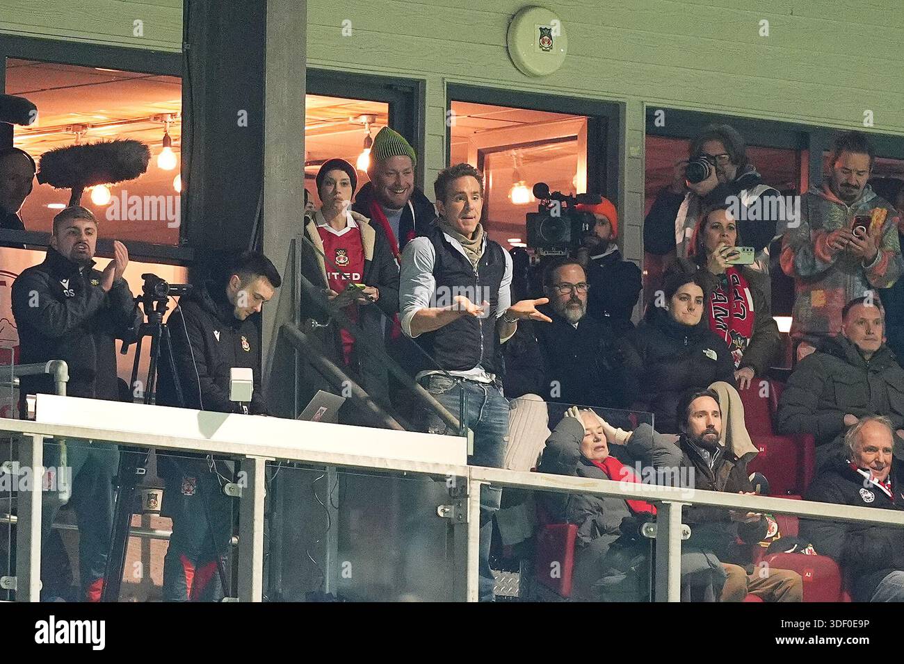 Wrexham co-owner Ryan Reynolds reacts as he watches from the stands ...