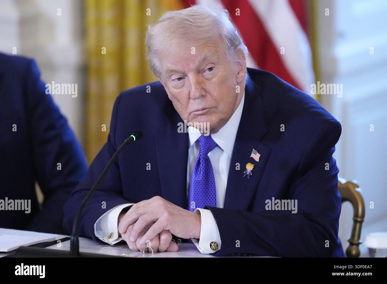President Donald Trump listens during a meeting with oil executives in ...