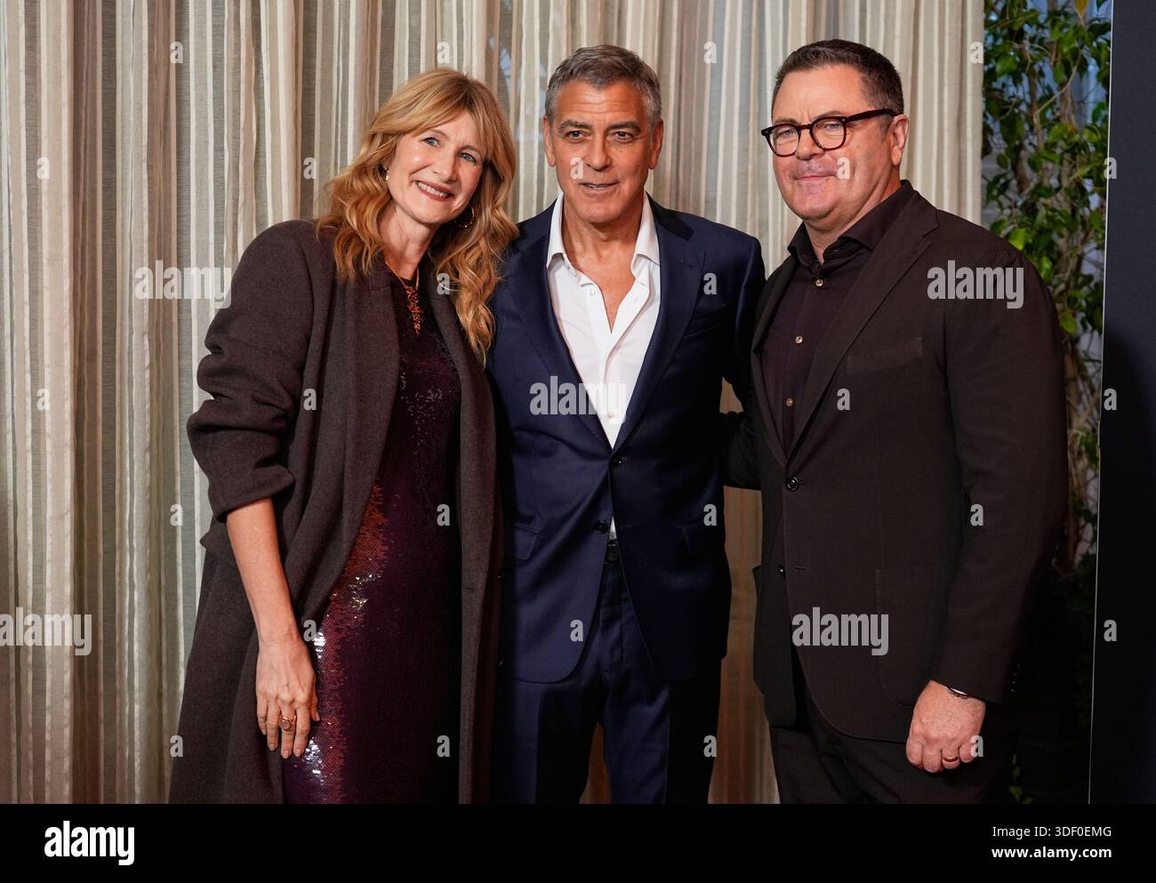 Actors Laura Dern, from left, George Clooney and Nick Offerman pose ...