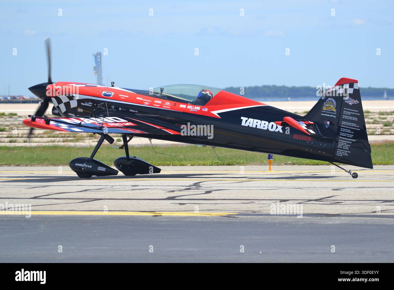 Rob Holland in his unique aerobatic aircraft at Quonset State Airport ...