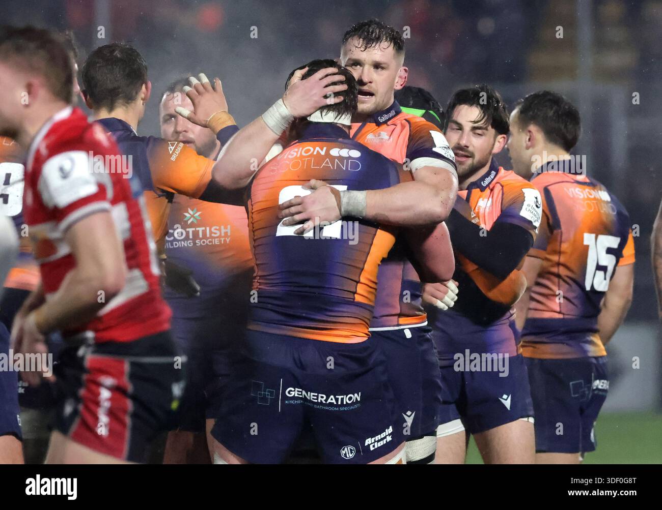 Edinburgh's Ben Muncaster hugs team-mate Magnus Bradbury following the ...