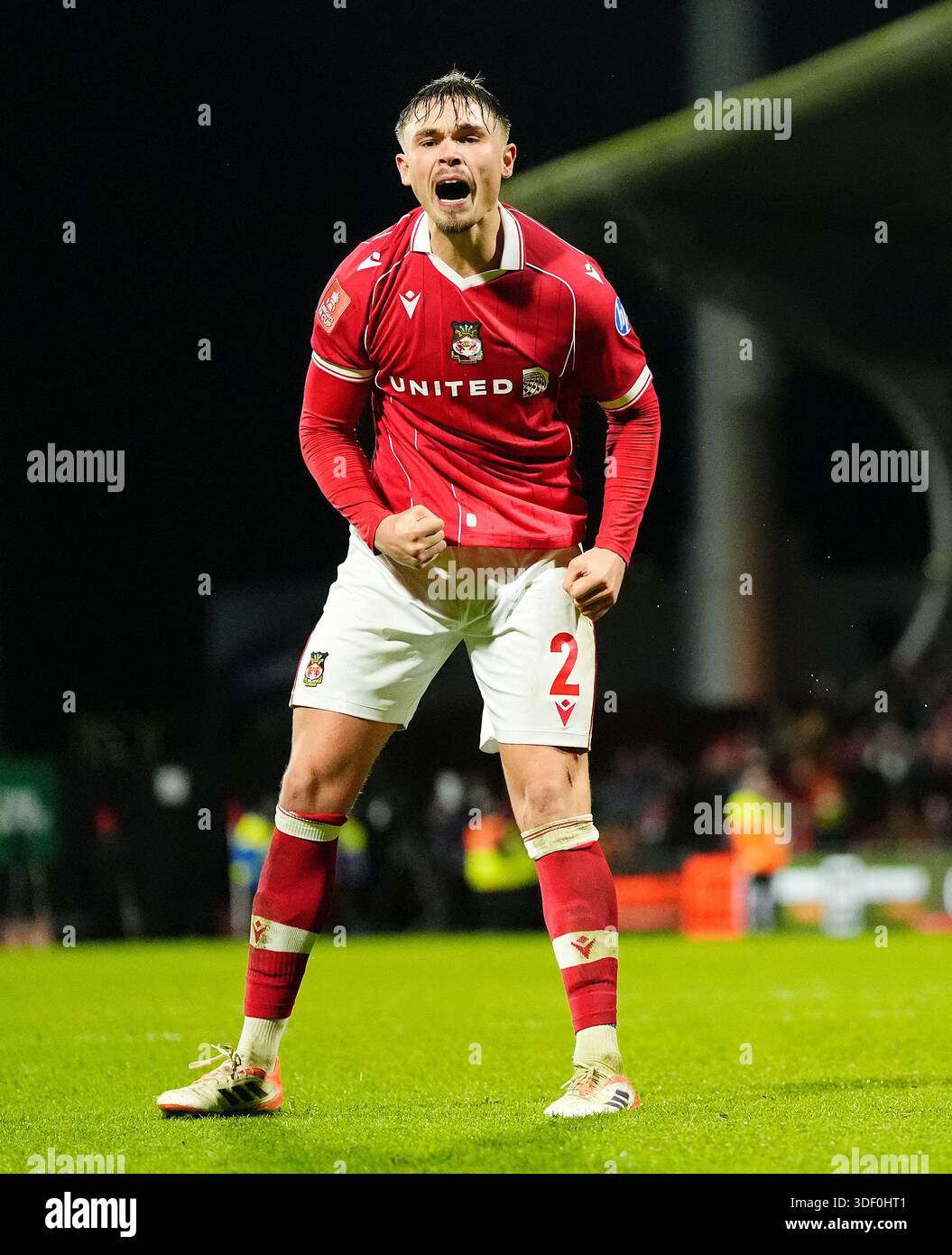 Wrexham's Callum Doyle celebrates scoring in the penalty shoot-out ...