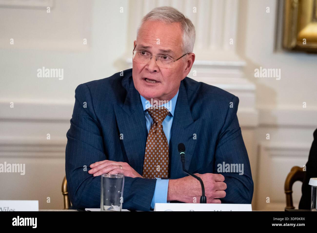 CEO of ExxonMobil Darern Woods speaks during a meeting with President ...