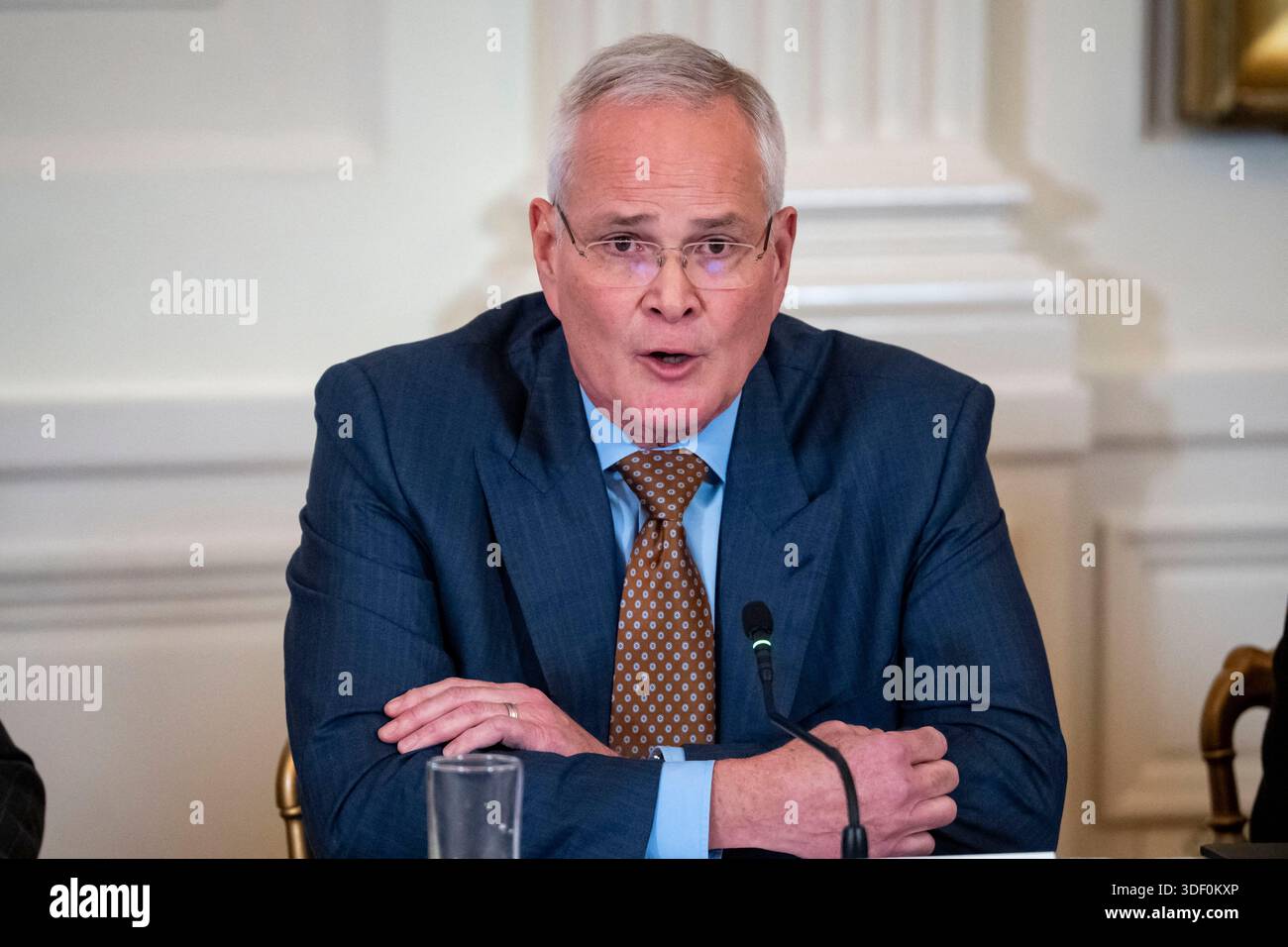 CEO of ExxonMobil Darern Woods speaks during a meeting with President ...