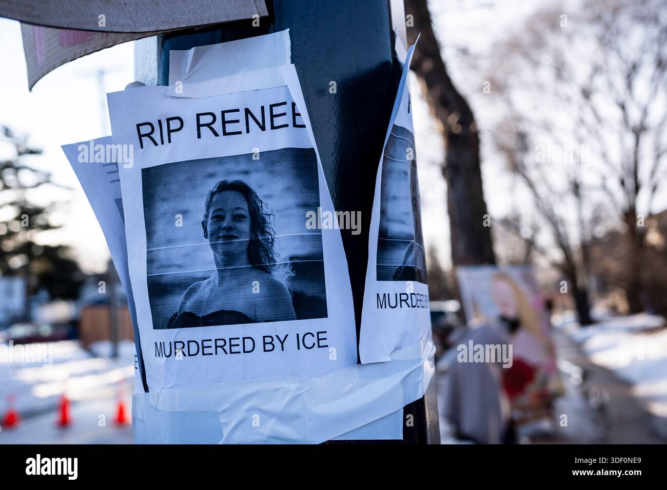 Signs are posted on the street where Renee Good was fatally shot by an ...