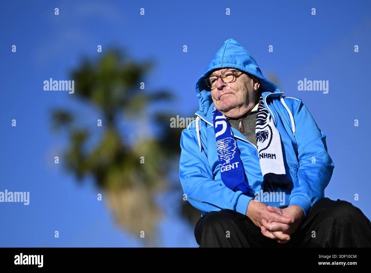 A fan attends a friendly soccer game between Belgian KAA Gent and ...