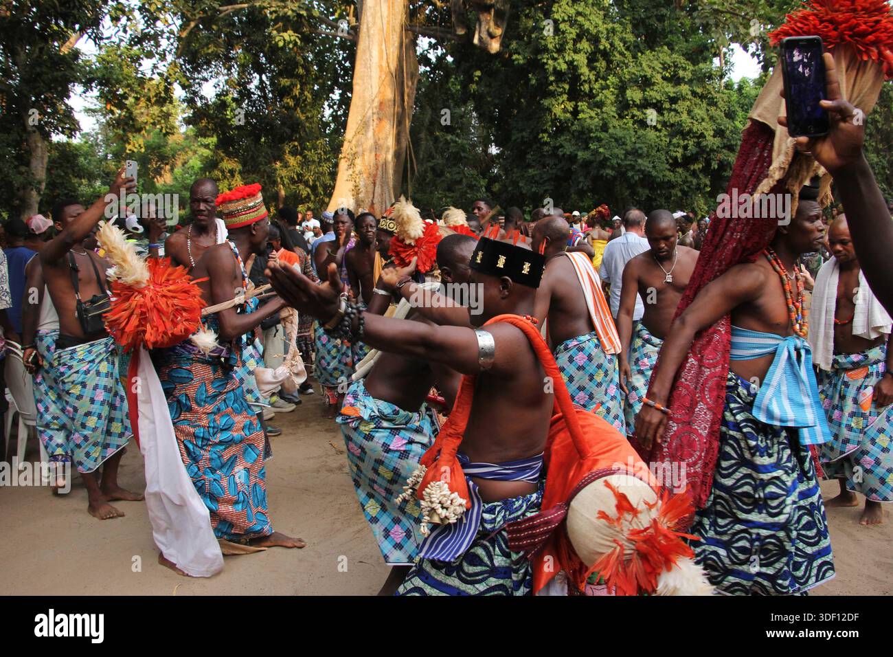 Ouidah, Benin. 8th Jan, 2026. Locals dressed in traditional costumes ...