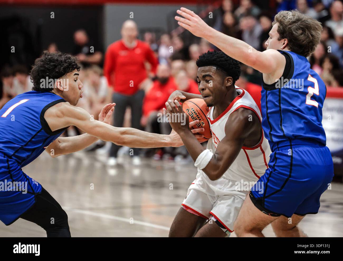 Daviess County's Jonathan Moss, second from right, charges to the ...