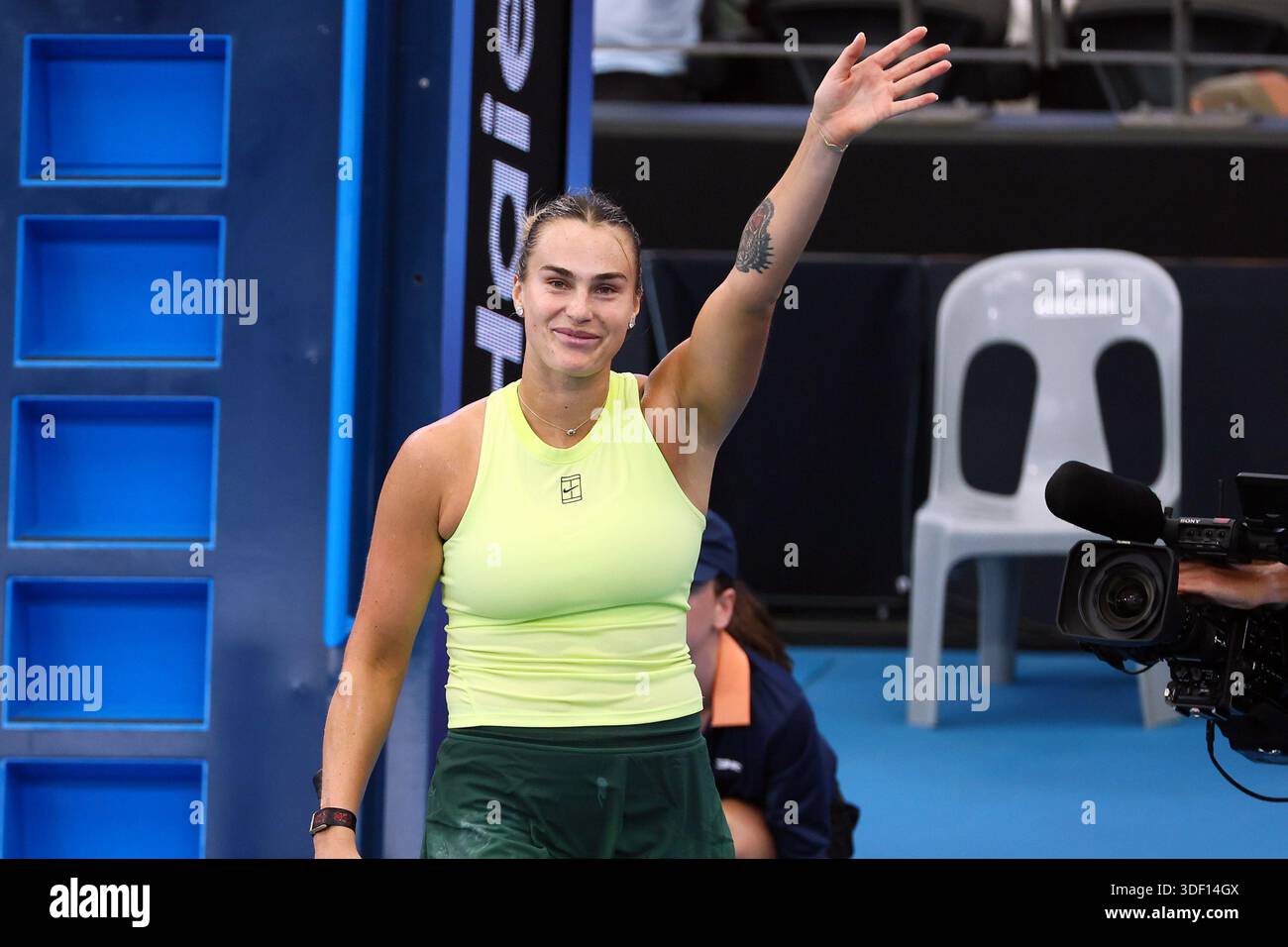 Aryna Sabalenka, of Belarus waves at the crowd after she won her ...
