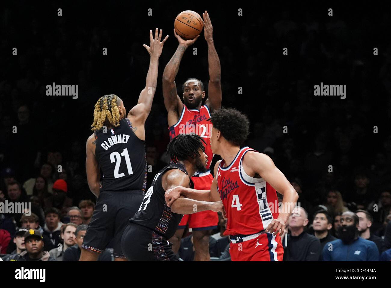 LA Clippers' Kawhi Leonard (2) shoots over Brooklyn Nets' Noah Clowney ...