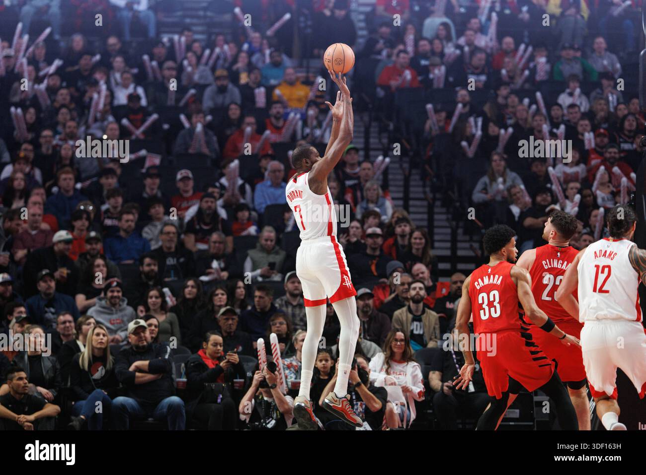 Houston Rockets forward Kevin Durant, center, shoots against the ...