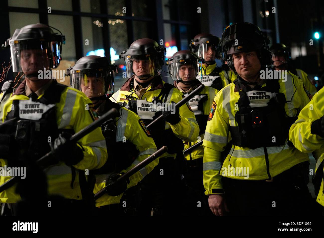 Minnesota State Patrol officers are seen during a protest and noise ...