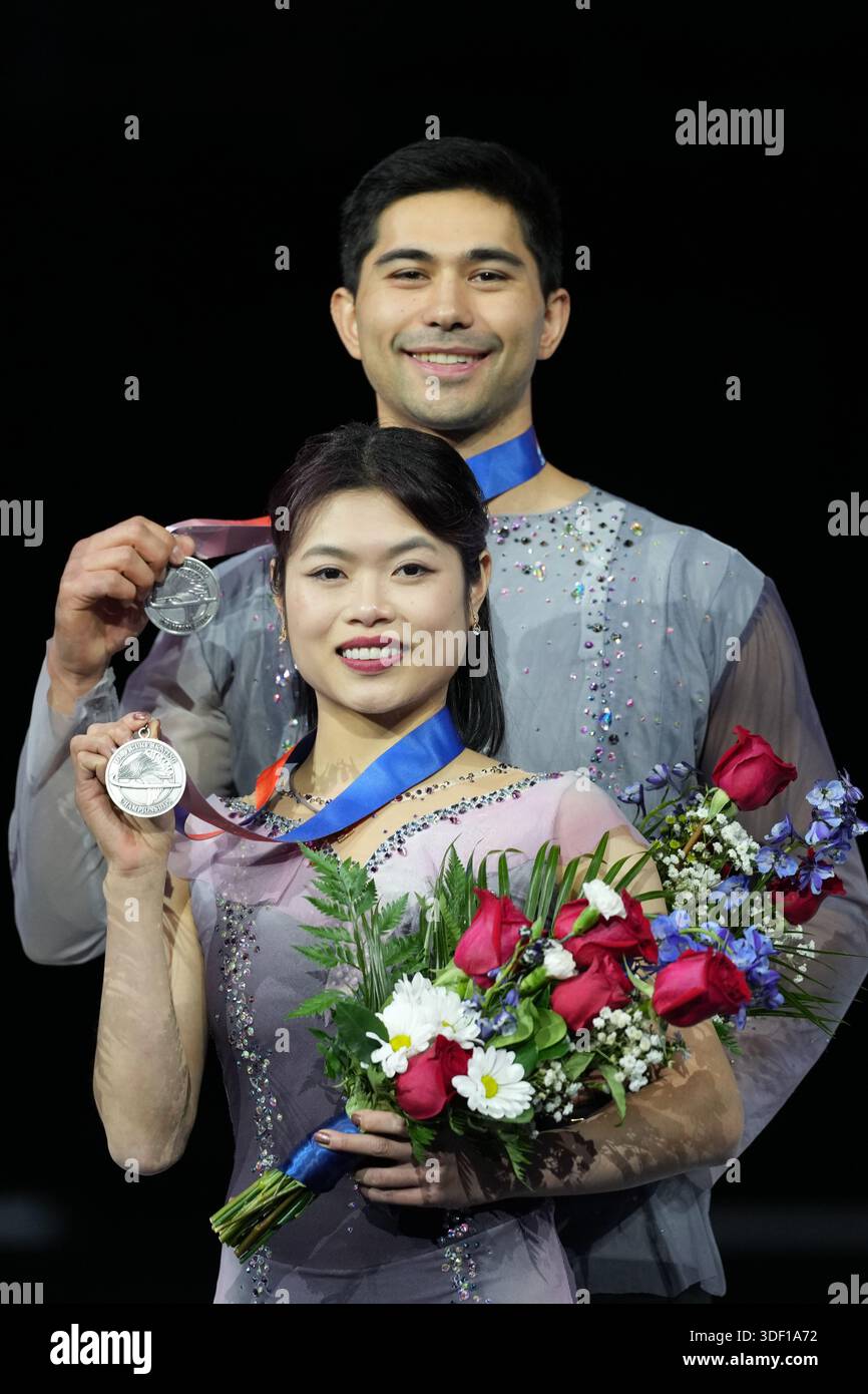 Fourth place finishers Emily Chan and Spencer Akira Howe hold up their ...