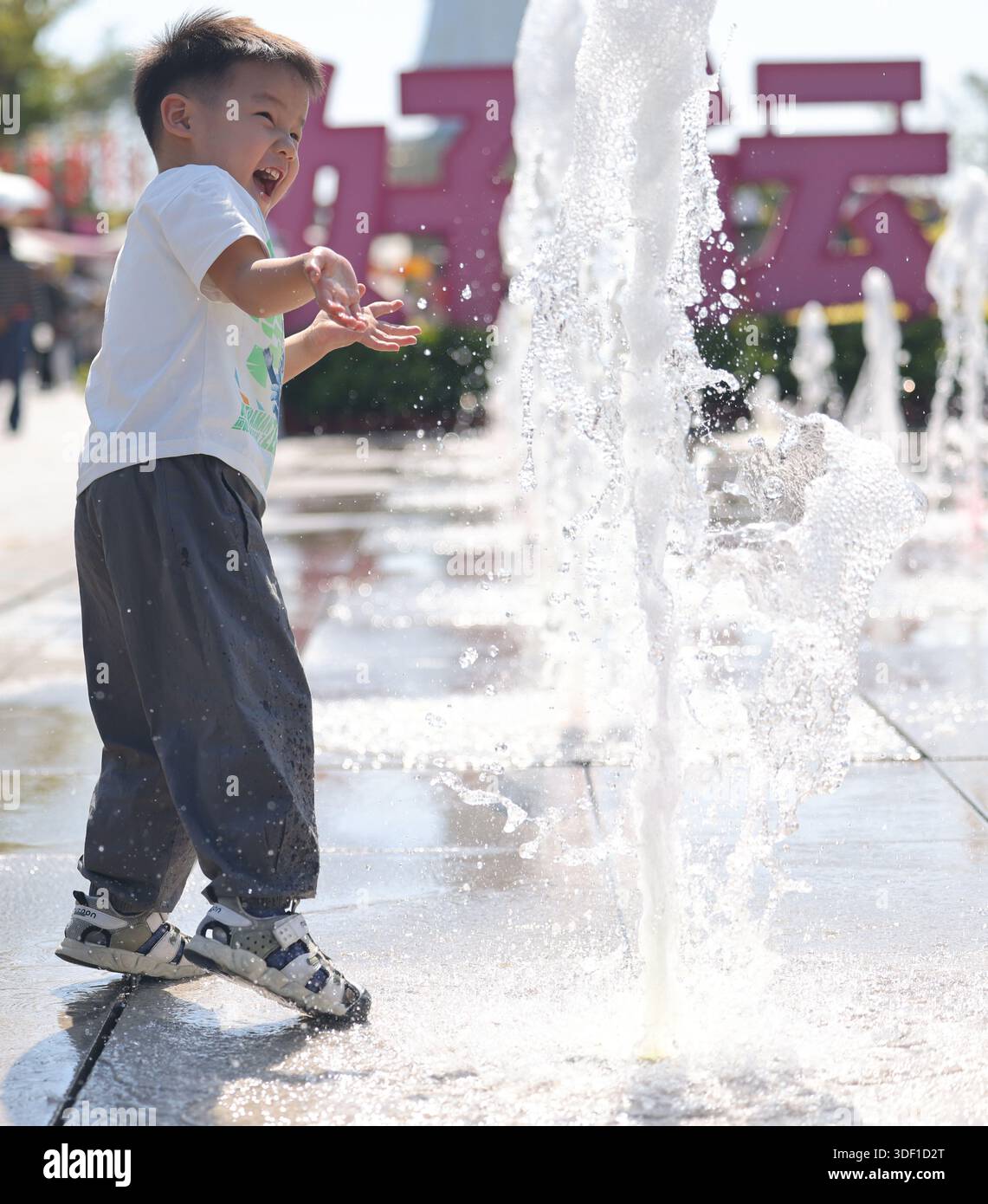 Sanya, China's Hainan Province. 9th Jan, 2026. A boy plays with water ...