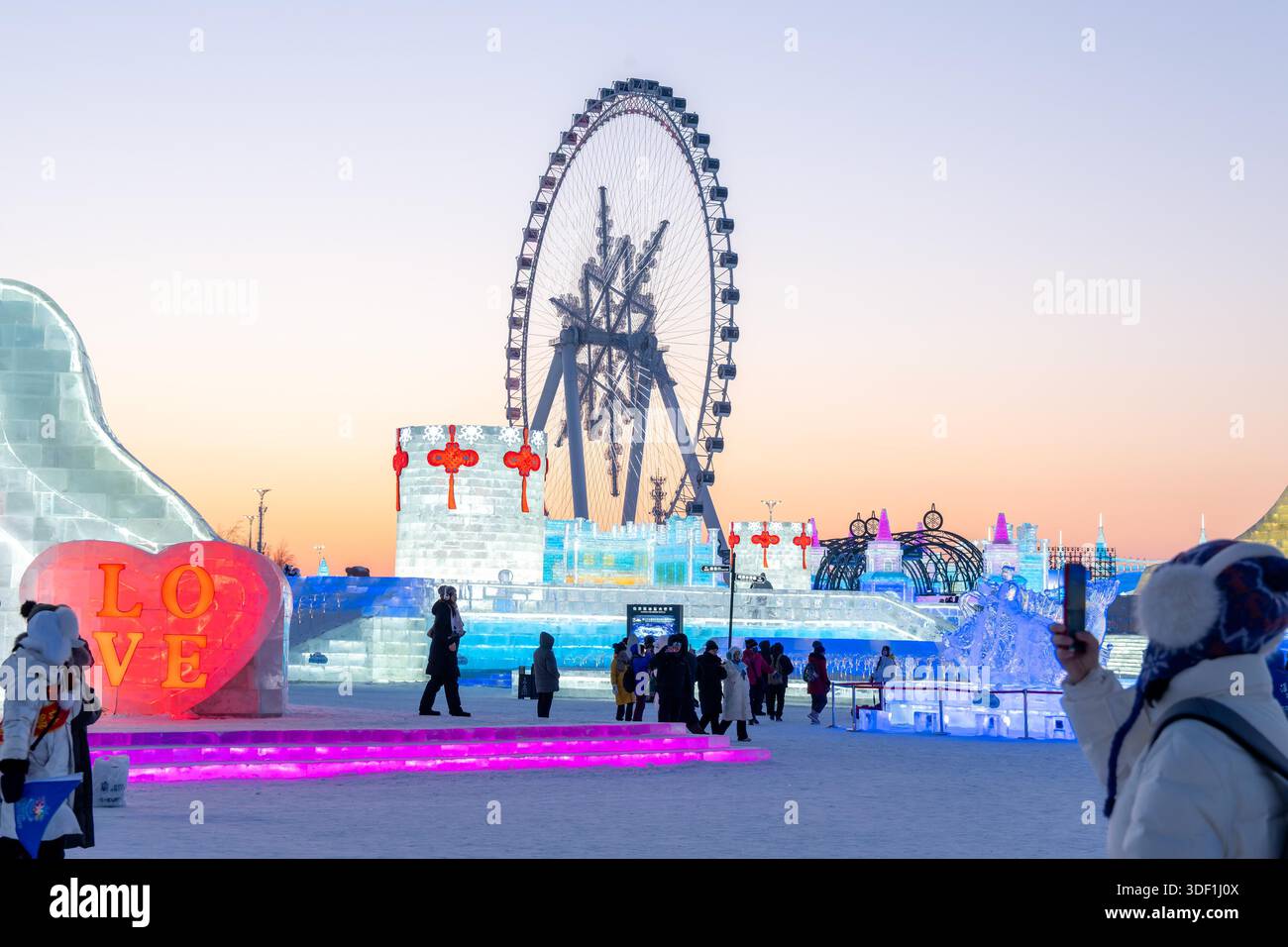 Fireworks illuminate ice sculptures and drones perform aerial ...