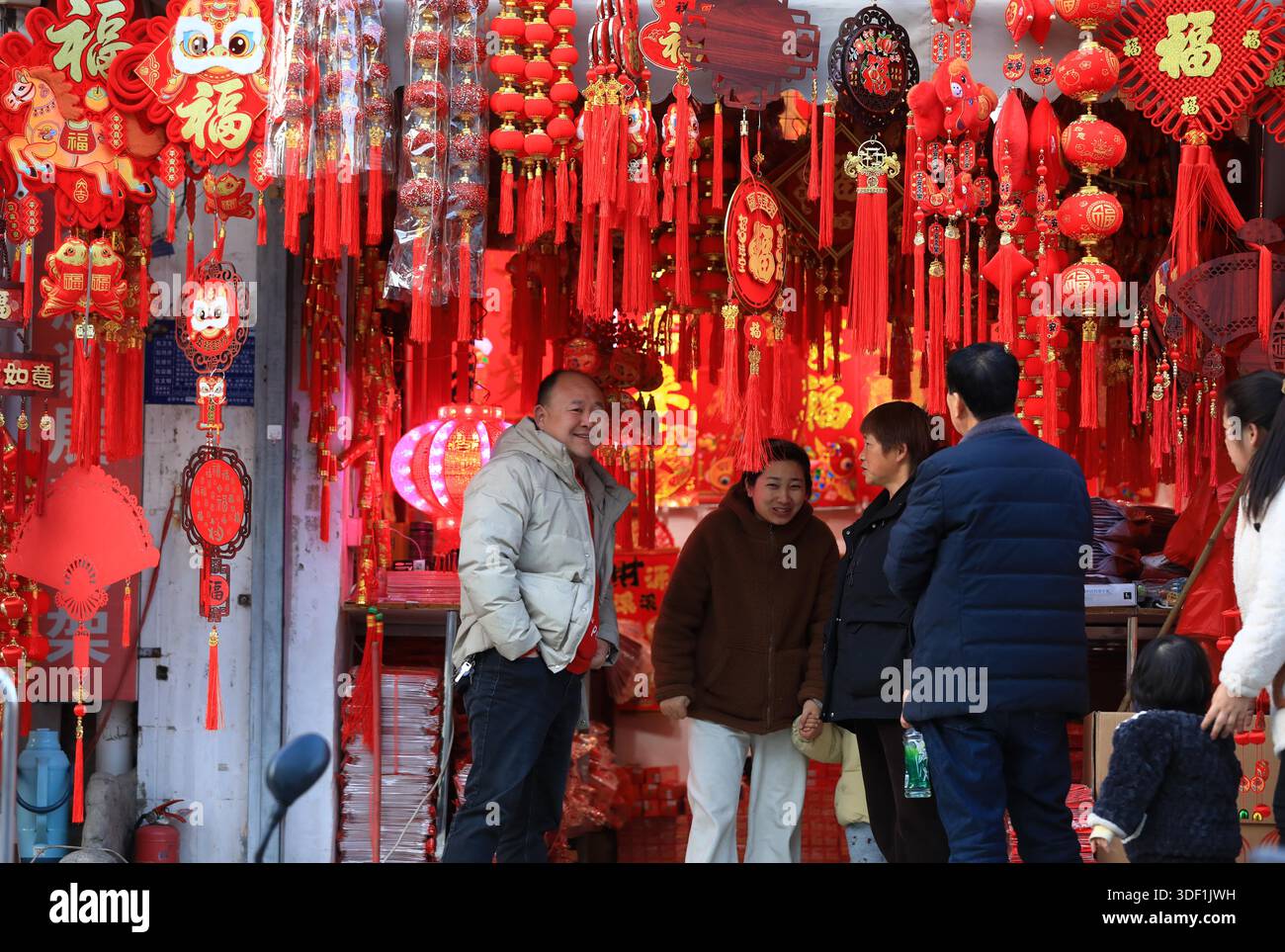 Citizens shop for festive decorations at the Huitong Small Commodity ...
