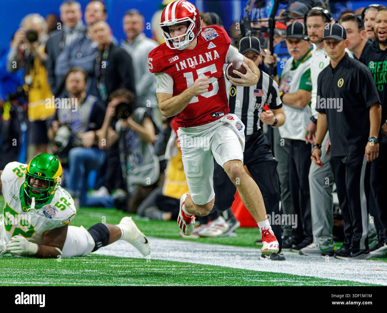 Atlanta, Georgia. 9th Jan, 2026. Indiana's Fernando Mendoza runs for ...