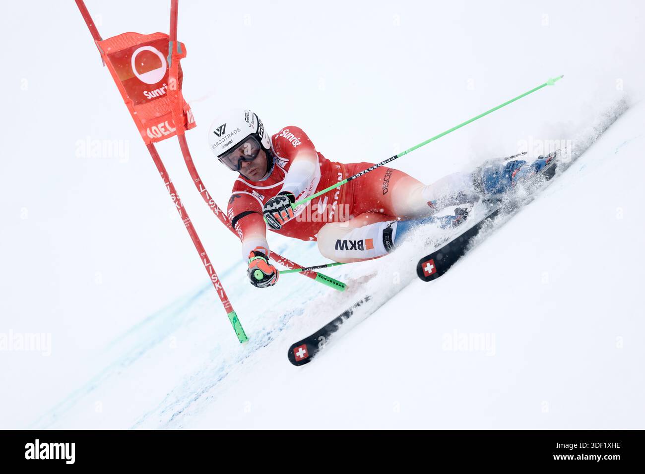 Switzerland's Thomas Tumler speeds down the course during an alpine ski ...